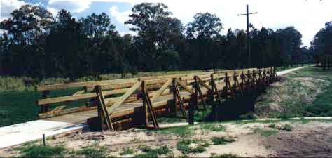 Pedestrian Log Bridges to 8 Metres length from Outdoor Structures Australia